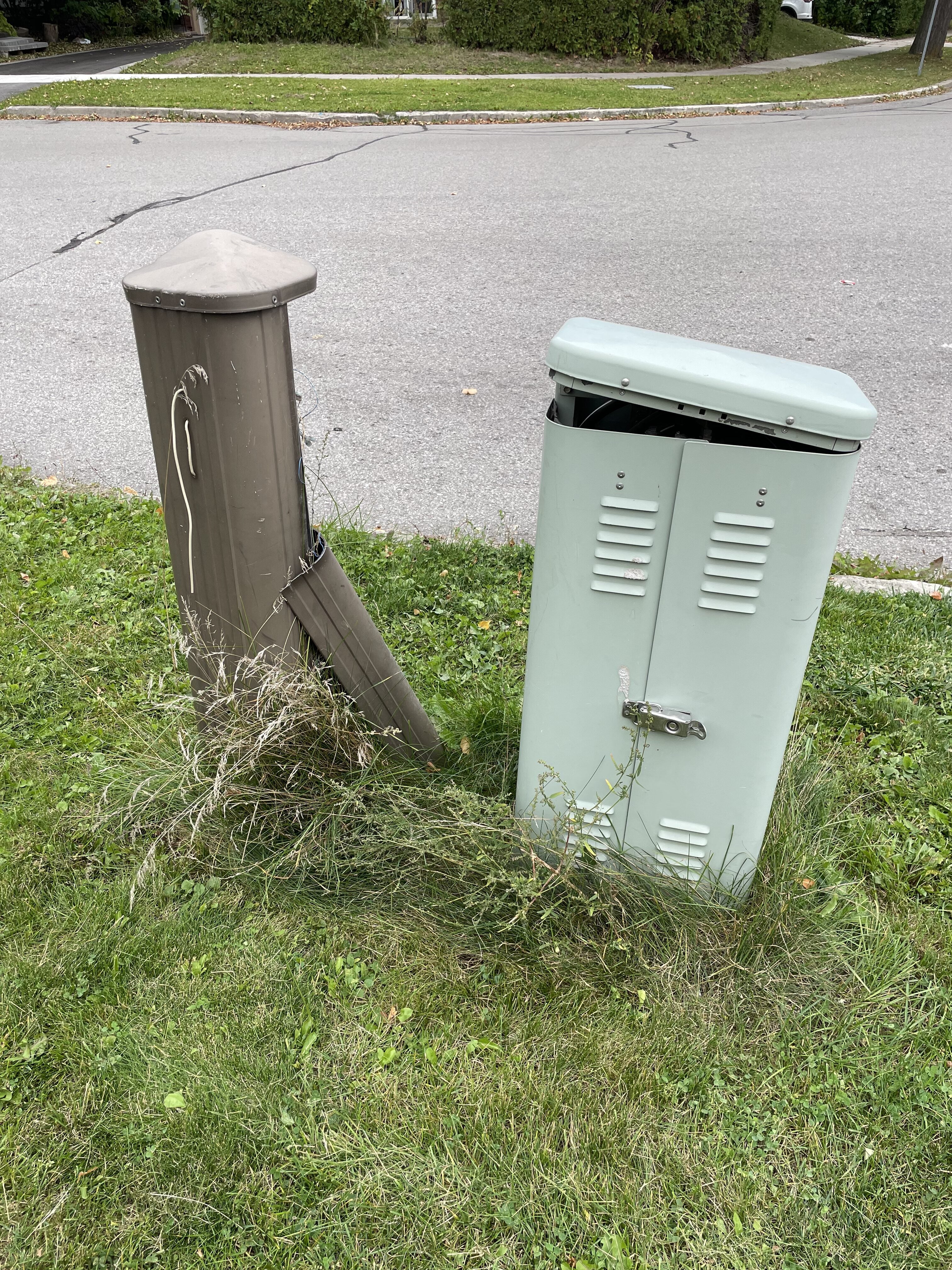 Abandoned Pair of Utility Boxes in my parents' front yard ...