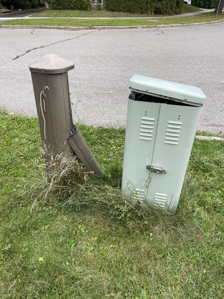 Abandoned Pair of Utility Boxes in my parents' front yard ...